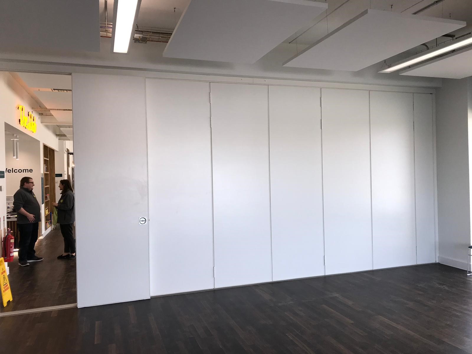 How do operable partition walls compare to sliding walls? - AEG Partitions